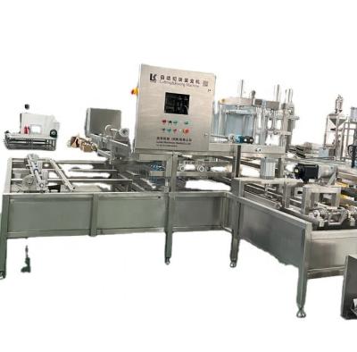China 1500 B/h Capacity Automatic Bean Curd Cutting and Casing Machine for Tofu Production for sale