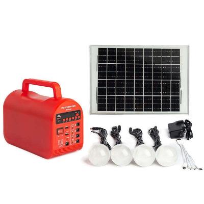 China 10W Solar Lighting System With 4 Bulbs Portable Mini Outdoor Camping Speaker Radio for sale