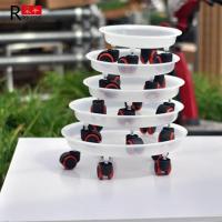 China 30cm White Plastic Flower Pot Base with 4 Rollers - Movable Plant Container Stand with Wheels for sale