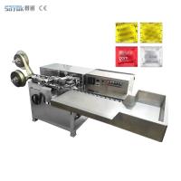 China OEM Automatic Latex Condom Packing Equipment Four Side Sealing Packaging Machine for sale