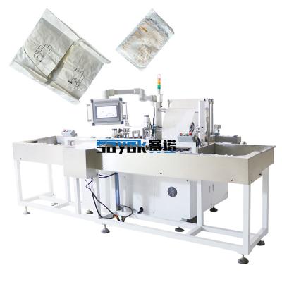 China High Efficient Surgical Glove Paper Wallet Type Wrapping Machine With Bi-fold Device for sale