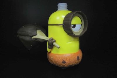 China Hawail Style  Cartoon Shampoo Bottle With Cute Weapon Yellow / Brown Color for sale