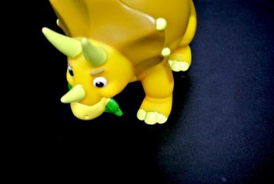 China 6 Inch Yellow Dinosaur Collectible Vinyl Toys 80 - 90 Degree For Kids Play for sale