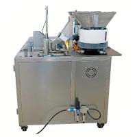 China Double Disk Premade Pouch Packing Machine Counting Premade Pouch Filling Sealing Machine 2.6KW for sale