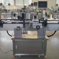 China Vertical Adhesive Labeling Machine Fully Automatic Round Bottle Labeling Machine for sale