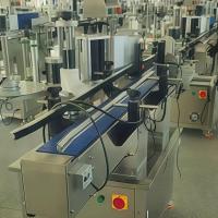 China Vertical Adhesive Labeling Machine Fully Automatic Round Bottle Labeling Machine for sale