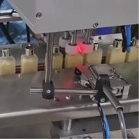 China Four Head Servo Capping Machine Customized Automatic Bottle Capping Machine High Speed for sale