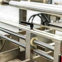 China Servo 3D Box Packing Machine High Speed Film Sealing Machine for sale