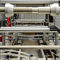 China Servo 3D Box Packing Machine High Speed Film Sealing Machine for sale