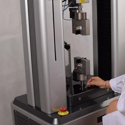 China Utm Tensile Testing Machine 10KN ASTM D5035 For Nonwoven Fabric for sale