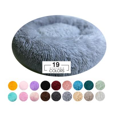 China Soothing Small Kitten Pet Calming Beds 70cm Peaceful Pooch Bed Ventilated for sale