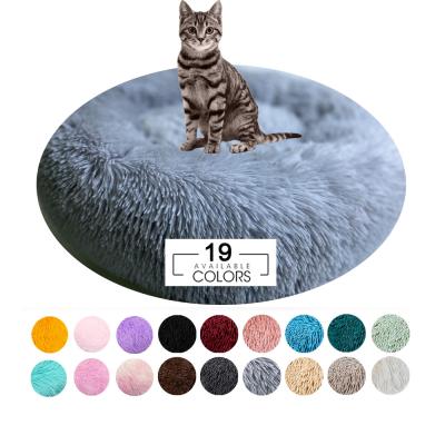 China Colorful Luxury Pet Calming Beds Large Comfy Plush Donut Cat Bed for sale