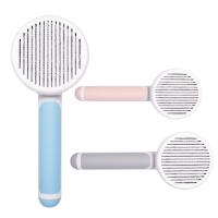 China Dog Shedding Comb Pet Grooming Tool Massage Detangling Loose Undercoat for sale
