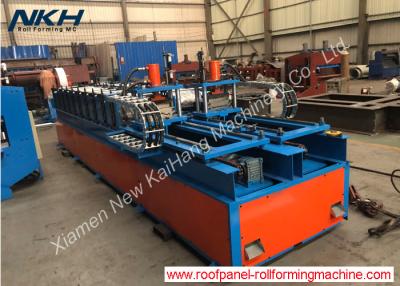 China Servo Move 0.6mm PPGI Wall Panel Roll Forming Machine for sale