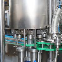 China 6000CPH Automatic Canning Machine 4 Spindles Beer Can Filler Machine for sale