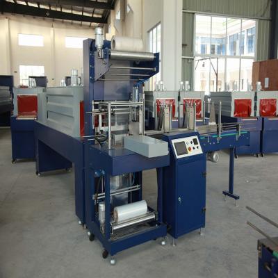 China L Type Semi Automatic Shrink Wrapping Machine 100 Micro Film Shrink Wrapper for sale