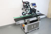 China Automatic Print and Labeling Machine 300dpi 30-80pcs/min for Flat Objects Barcode Labeling for sale