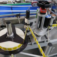 China Easy to Operate Automatic Carton Box Sticker Sealing Machine for Pallet Cargo for sale