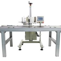 China Automatic Flat Sticker Labeling Machine for Bags Pouch Cards Label Size 10-140mm OD 300mm for sale