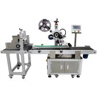 China Automatic Surface Labeling Applicator for Socks Package Flat Pouch 300dpi 30-80pcs/min for sale