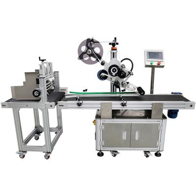 China Automatic Surface Labeling Applicator for Socks Package Flat Pouch 300dpi 30-80pcs/min for sale