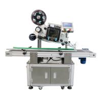 China Automatic Surface Labeling Applicator for Socks Package Flat Pouch 300dpi 30-80pcs/min for sale