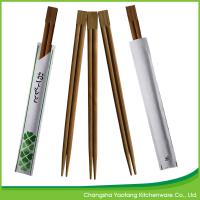 China Carbonized Black Bamboo Chopsticks Disposable 24cm With Semi Closed Paper Sleeve for sale