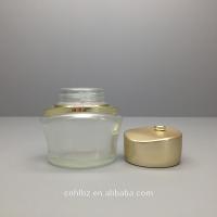 China OEM White Frosted Cosmetic Packaging Glass Bottles And Jars With Cap And Pump for sale