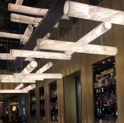 China Custom Hotel Indoor Deco Modern Hanging Dining Room Pendant Light Nordic Luxury Brass Alabaster Linear Big Chandelier for sale