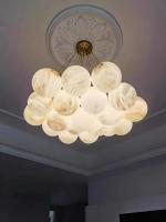 China Custom Round Alabaster Ball Stairs Decorative Chandelier Natural Marble Led Chandelier Lighting for sale