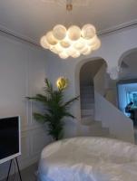 China Custom Round Alabaster Ball Stairs Decorative Chandelier Natural Marble Led Chandelier Lighting for sale