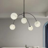 China Postmodern Creative Fashion Brass Living Room Chandelier Simplicity Light Luxury Hotel Bedroom Alabaster Pendant Light for sale