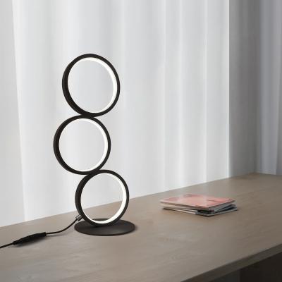 China Three Ring Elegant Metal Desk Lamp For Living Room Bedroom Hotel Club Lighting Modern Dimmable Aluminum Table Light for sale