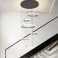 China Nordic Indoor Villa Big Lighting Chandelier Modern Creative Ring Hollow Rotating Pendant Light for sale