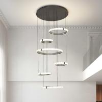 China Nordic Indoor Villa Big Lighting Chandelier Modern Creative Ring Hollow Rotating Pendant Light for sale