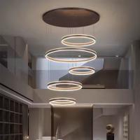 China Hotel Villa Stairs High Ceiling Hanging Black Coffee Gold Round Circle Ring Led Chandelier Pendant Light for sale