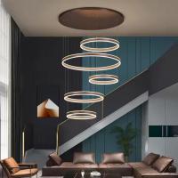 China Hotel Villa Stairs High Ceiling Hanging Black Coffee Gold Round Circle Ring Led Chandelier Pendant Light for sale