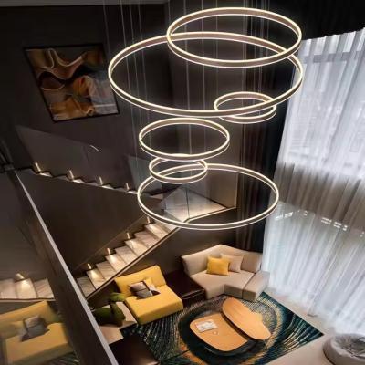 China Hotel Villa Stairs High Ceiling Hanging Black Coffee Gold Round Circle Ring Led Chandelier Pendant Light for sale
