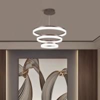 China Modern 3 Ring Design Hanging Decorative Ring Acrylic LED Chandelier Light Gold Hotel Lobby Living Room Long Stairwell Chandelier for sale