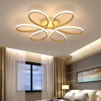 China Dimmable Gold Surface Mounted Led Acrylic Ceiling Light Minimalist Creative Ring Hanging Light Flower Shape Modern for sale