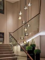 China Chocolate All Copper Staircase Pendant Lamp End Villa Living Room Light with Luxury Crystal and Rotating Function for sale
