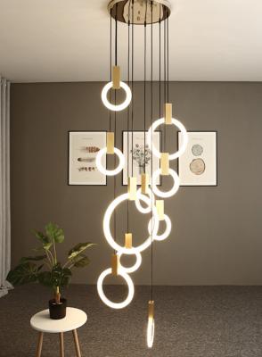 China Stair Loft Apartment Duplex Chandeliers Light With Modern Simple Pick For Villa Ring Long Chandeliers 10KG Gold/Custom Design for sale