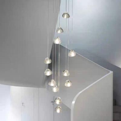 China Hotel Decoration Crystal Staircase Pendant Light With Transparent Ball And Crystal Body for sale