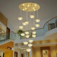 China Duplex building living room lamp creative ingot crystal villa pendant light spiral staircase long chandelier for sale