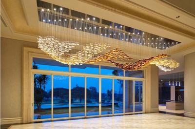 China Hotel Lobby Customized Glass Chandelier With Brass And Crystal Accents for sale