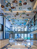 China Custom Non-Standard Cobblestone Glass Chandelier Hotel Lobby Sand Table Shape Atmoseric Lamp Sales Chandeliers Pendant Lights for sale