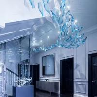China Customized Hotel Lobby Sales Department Banquet Hall Glass Chandelier In Creative Twist Leaf Shape For Villa Duplex Front Desk Project for sale