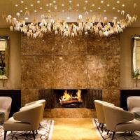 China Modern Light Art Deco Foyer Chandelier Stainless Steel And Glass Petal Hotel Front Desk Lamp for sale