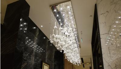 China Custom Hotel Lobby Chandelier Petal Pendant Rectangular Crystal String Creative LED Crystal Ceiling Chandelier for sale