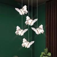 China Modern Simple Acrylic Transparent Butterfly Pendant Lamp Minimalist Multihead Hanging Design for Bedroom Bedside for Room for sale